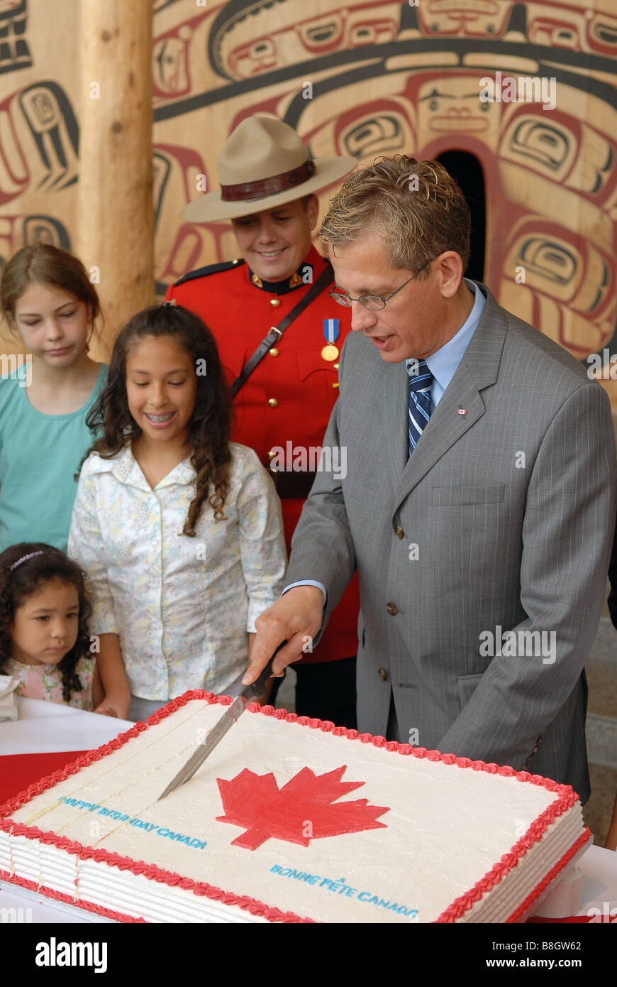 A crowd gathers around as Canada's birthday cake is cut at the Museum ...