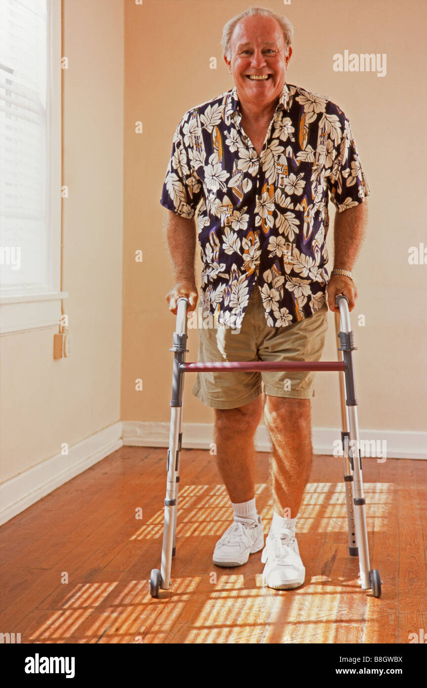 Seniors exercising, walking with walker,handicapped Stock Photo - Alamy