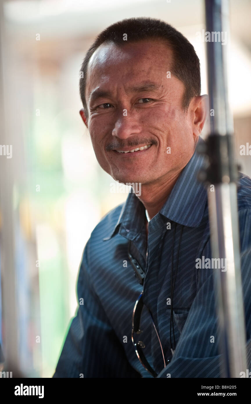 Smiling thai man Stock Photo - Alamy