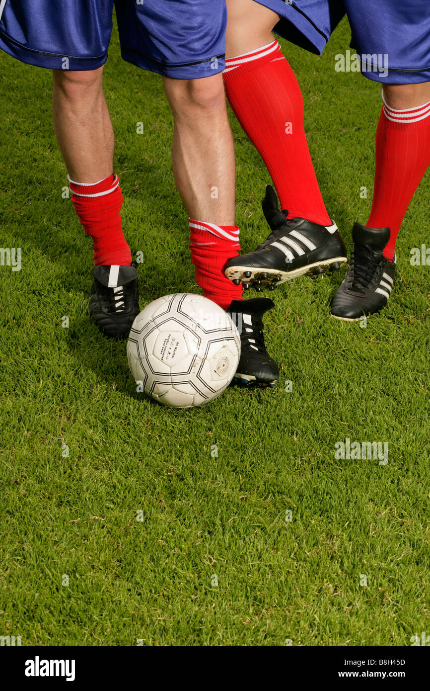 Two young men playing football (part of Stock Photo - Alamy