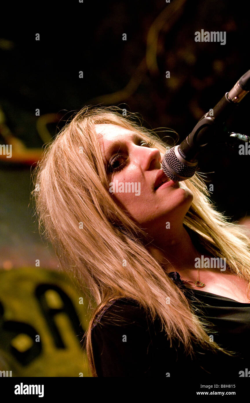 Singer with long blonde hair hi-res stock photography and images - Alamy