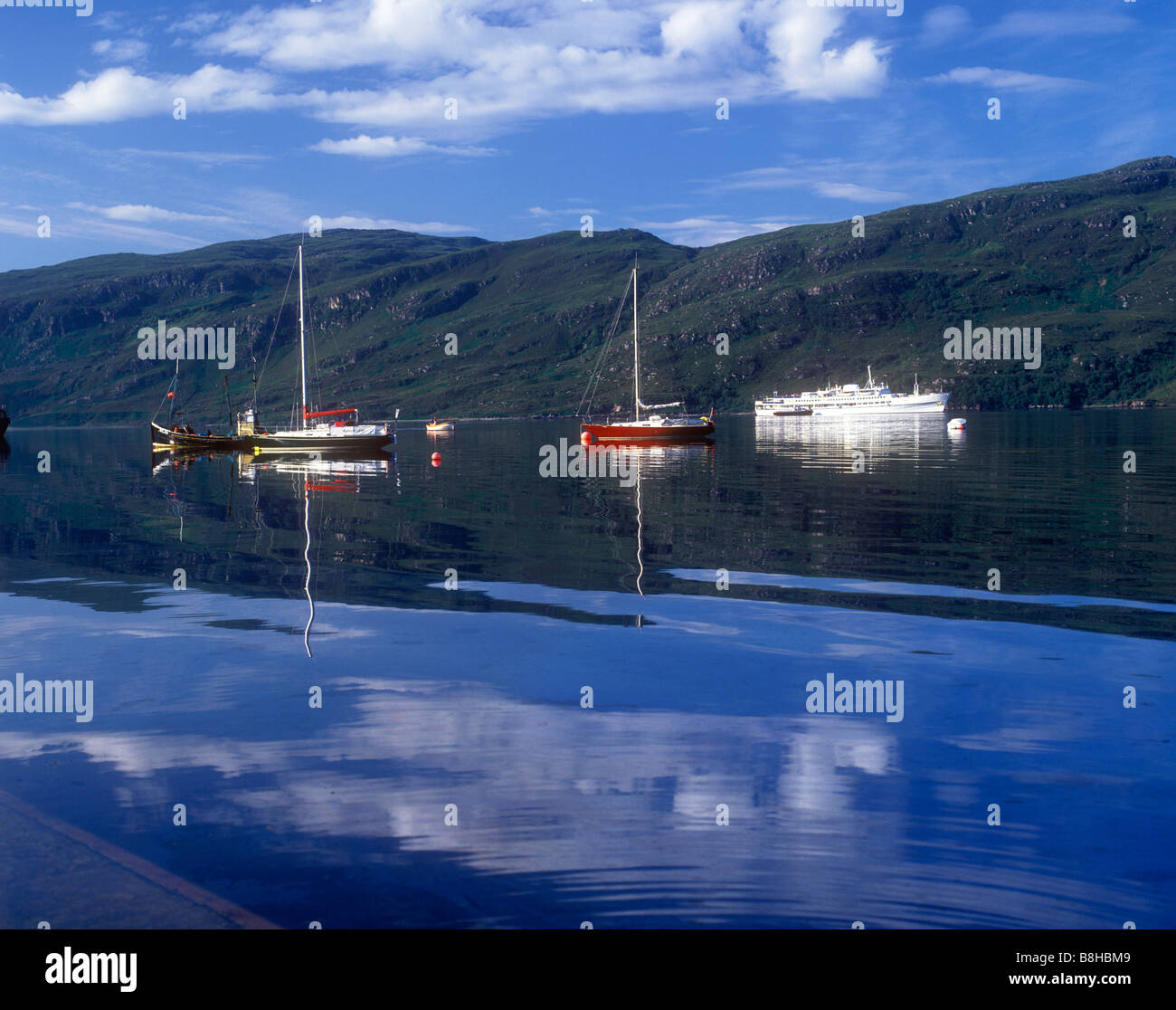 Cruise ship at anchor on a calm Loch Broom at Ullapool Stock Photo - Alamy