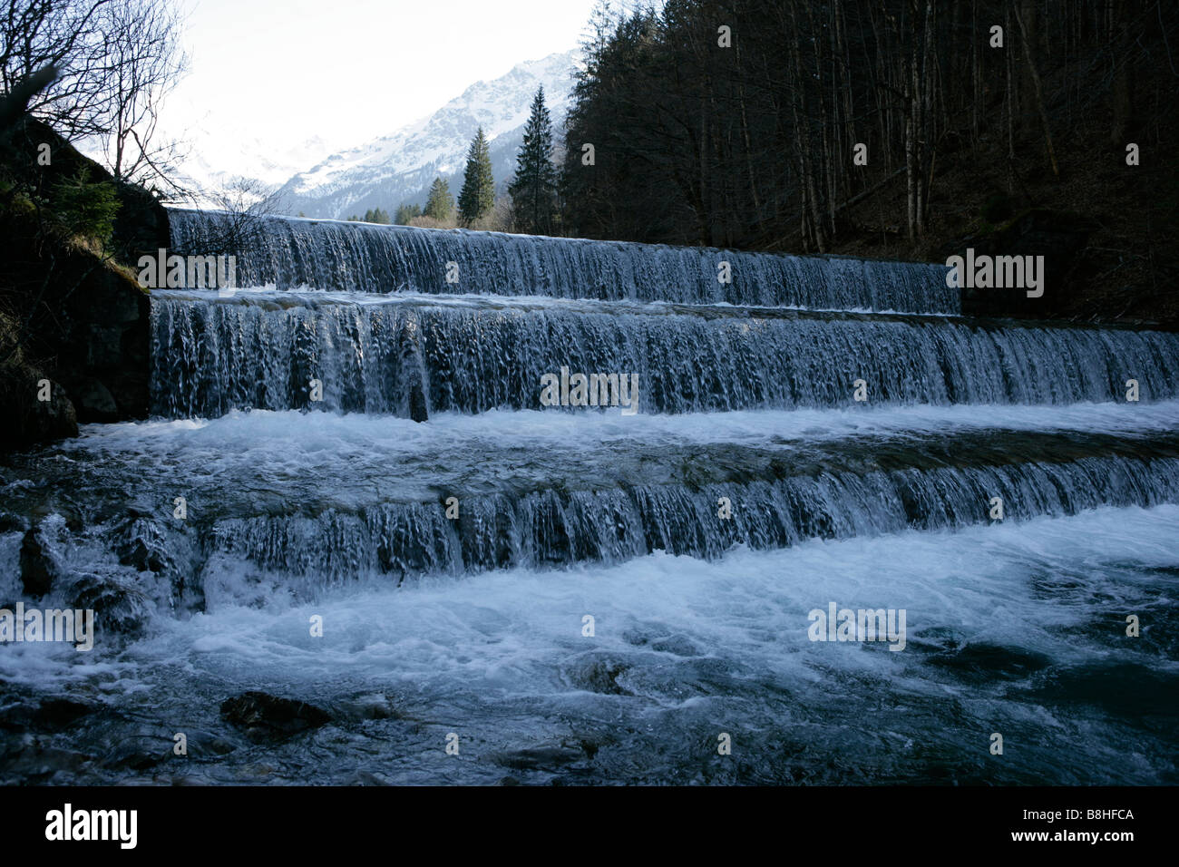 Picture of a small waterfall outside Stock Photo - Alamy