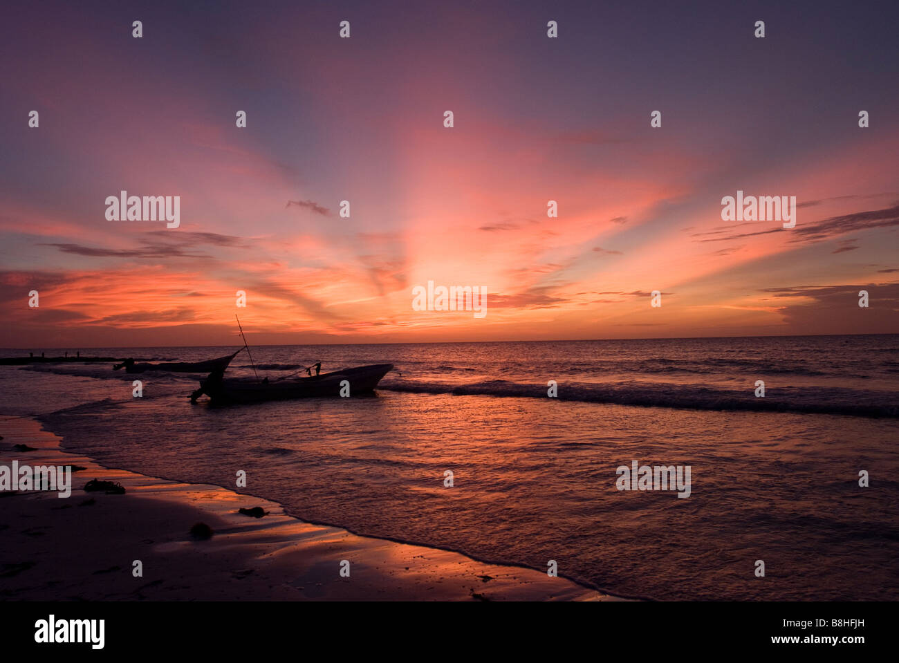 Fishing boat at sunset, Isla Holbox Mexico, Quintana Roo Stock Photo ...