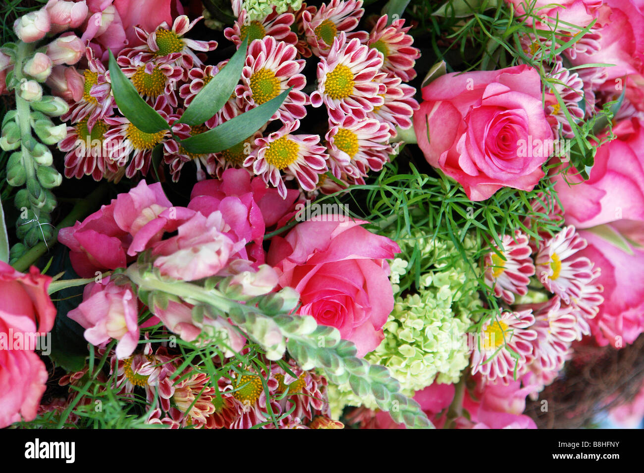 Picture of a decoration with pink roses outside Stock Photo - Alamy
