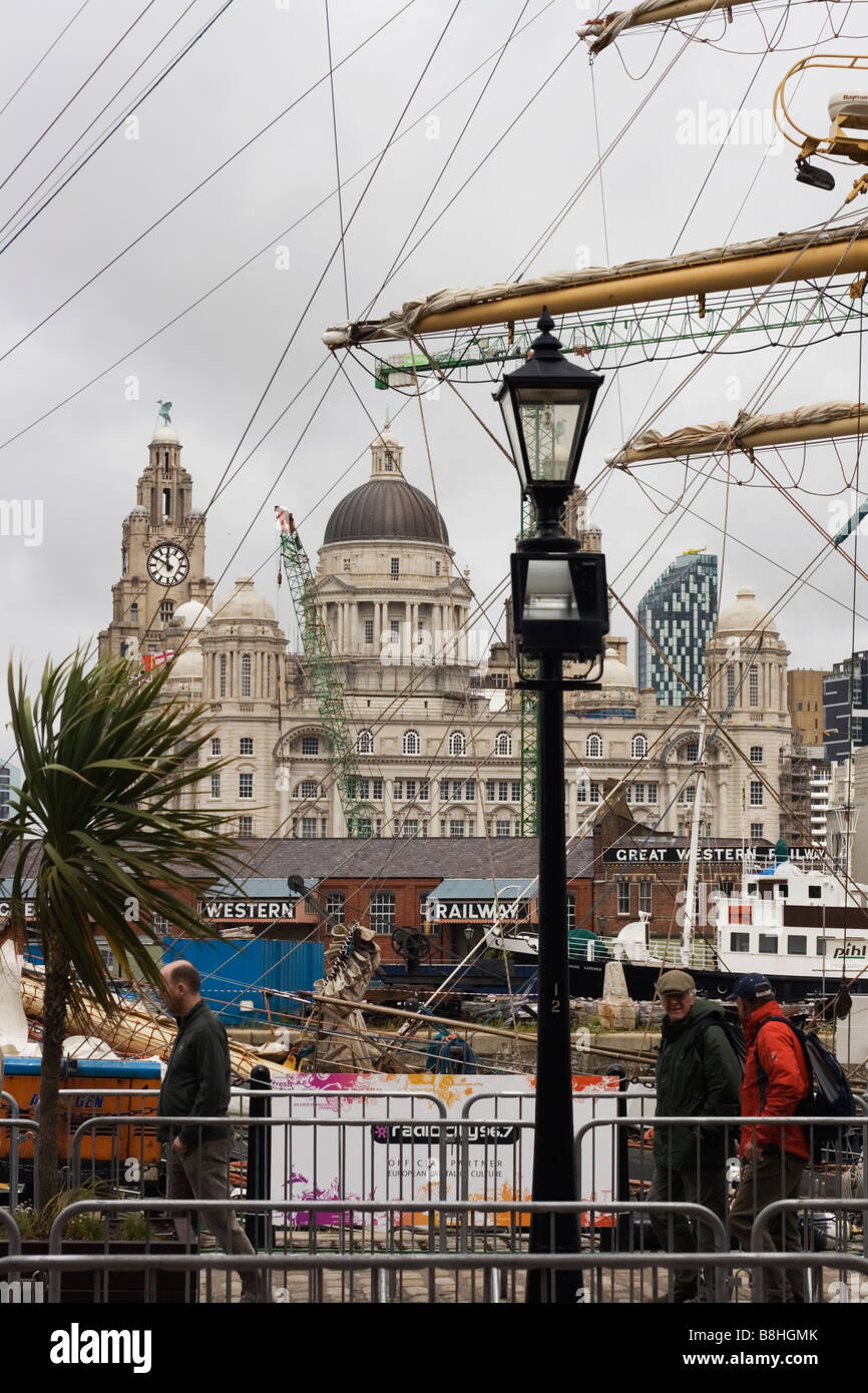 View of the Liver Buildings Liverpool UK through a tall ships mast and ...