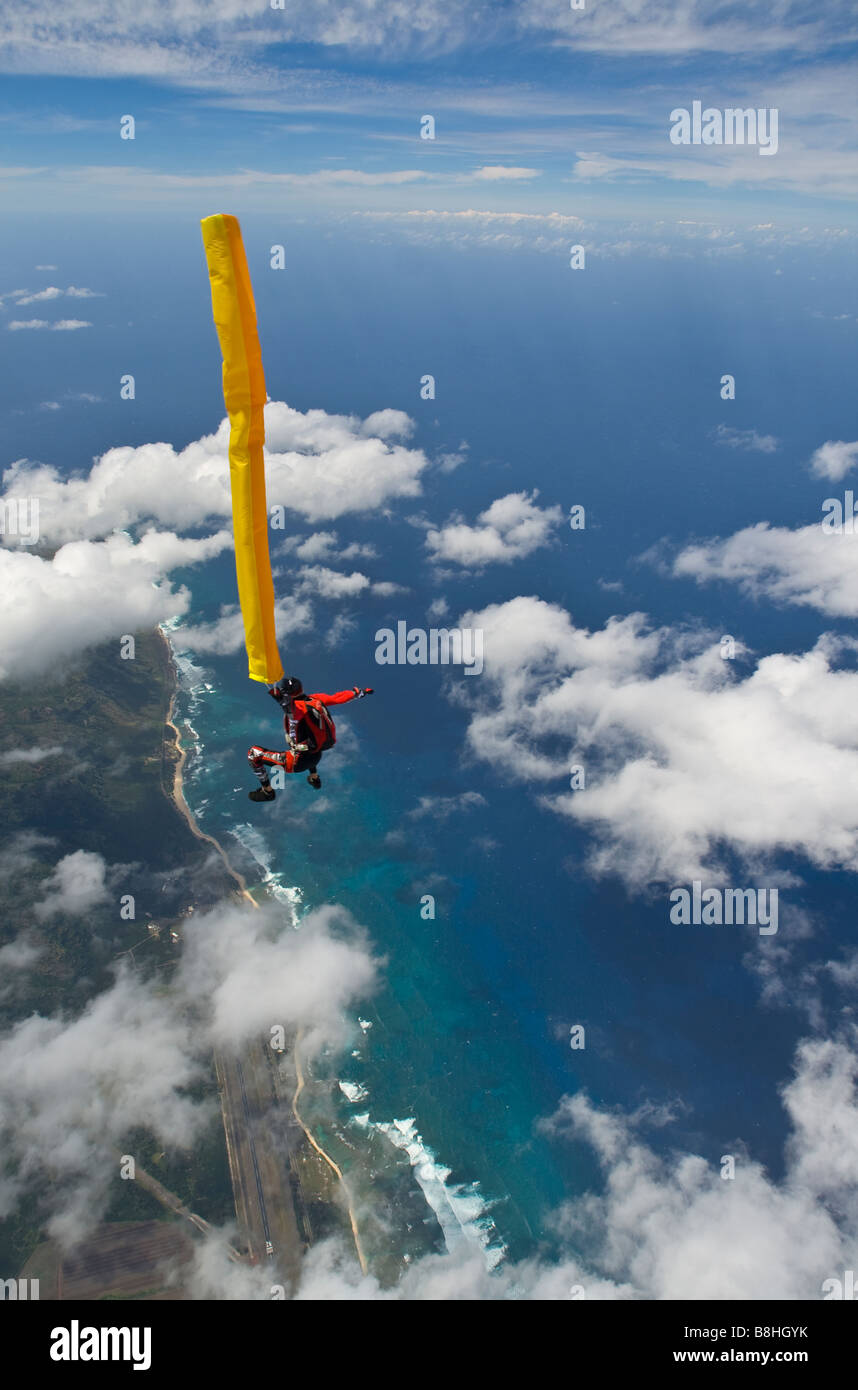 Skydive tube jump over Oahu, Hawaii, USA. Man is flying in sit position ...