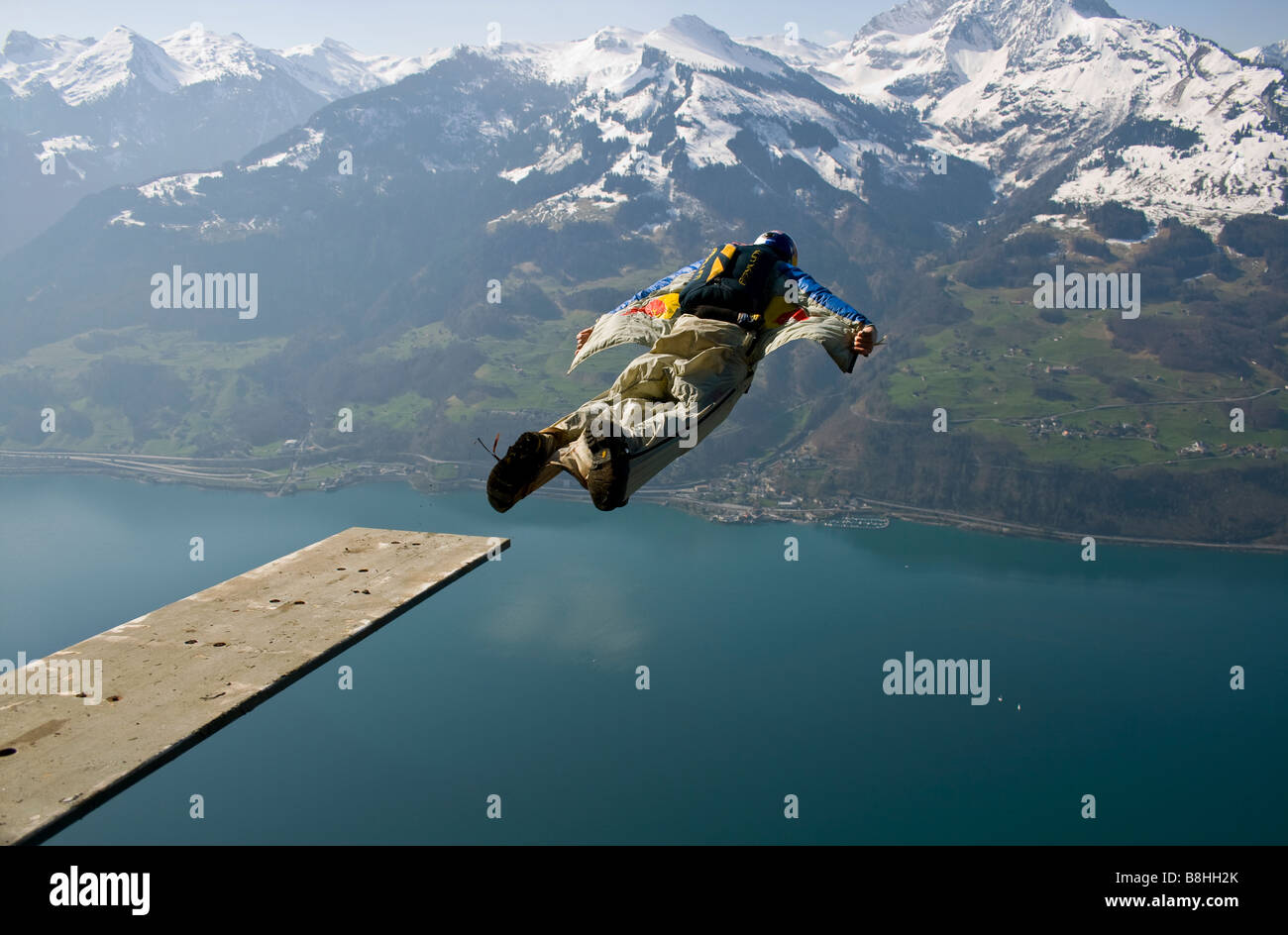 BASE jump into the big lake from an object. The ultimate kick to do a ...