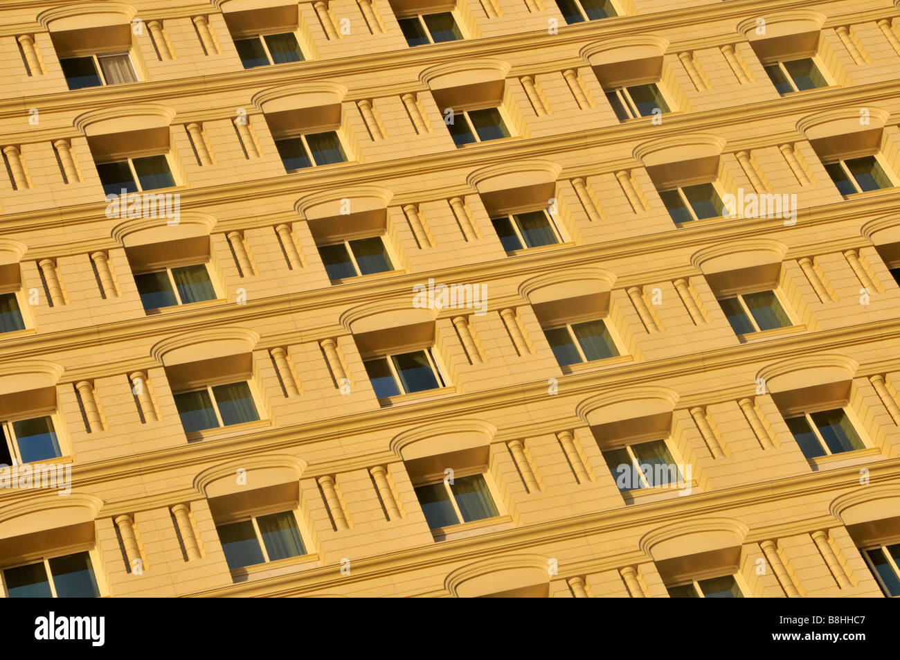 Dubai repetitive architecture facade & windows in modern building ...
