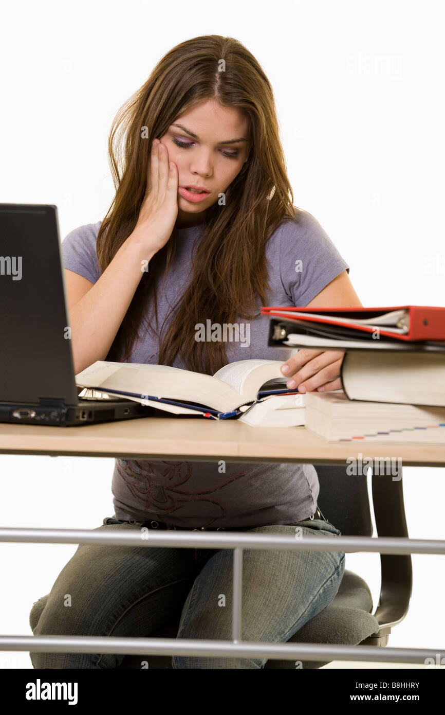 Student at desk Stock Photo - Alamy