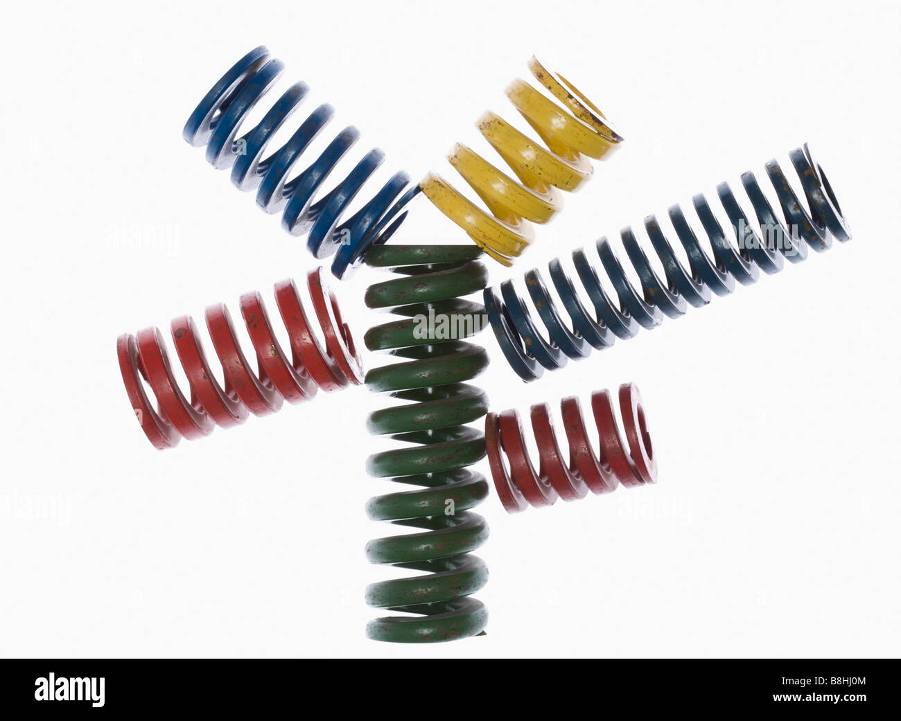 Colored industrial springs grouped in the studio Stock Photo - Alamy