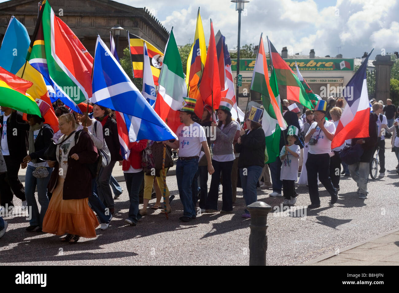 Crowd holding flags at pride hi-res stock photography and images - Alamy