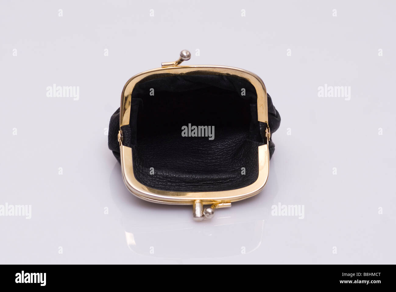 Empty woman's purse Stock Photo - Alamy