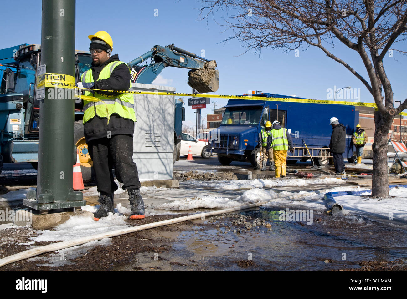 Detroit Michigan City workers repair a break in a water main Stock ...