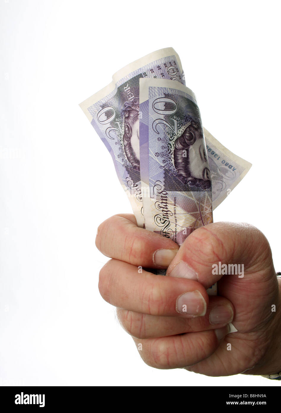 Fistful of cash Stock Photo - Alamy