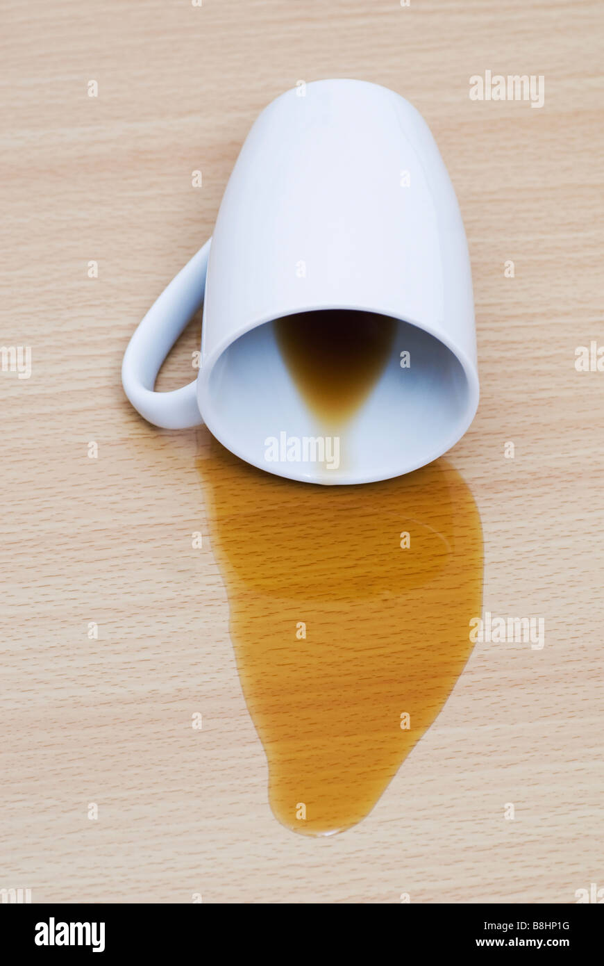 Spilled coffee on tabletop Stock Photo - Alamy