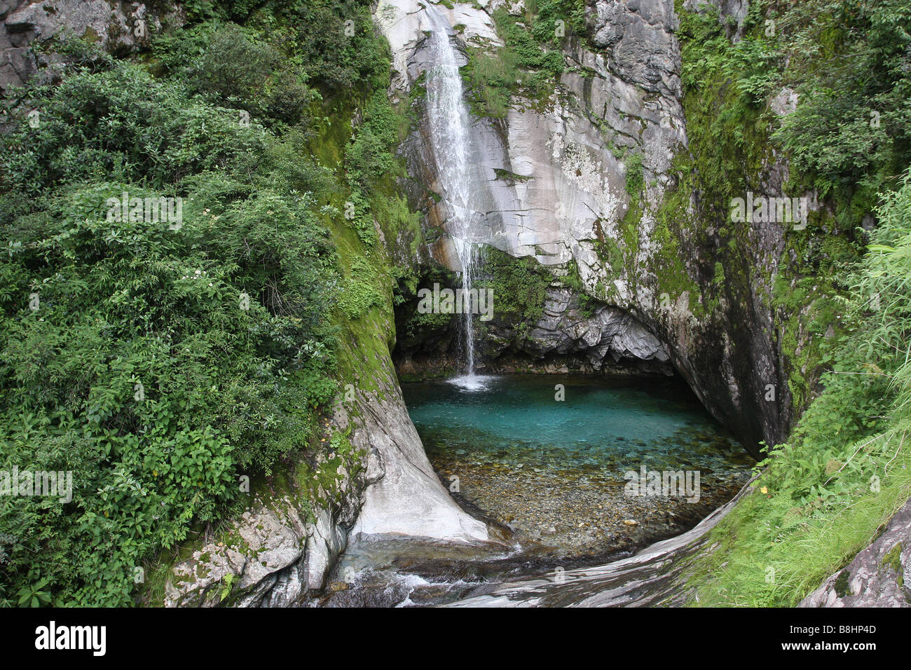 pond and waterfall at Cangshan Mountain, Dali, China Stock Photo - Alamy