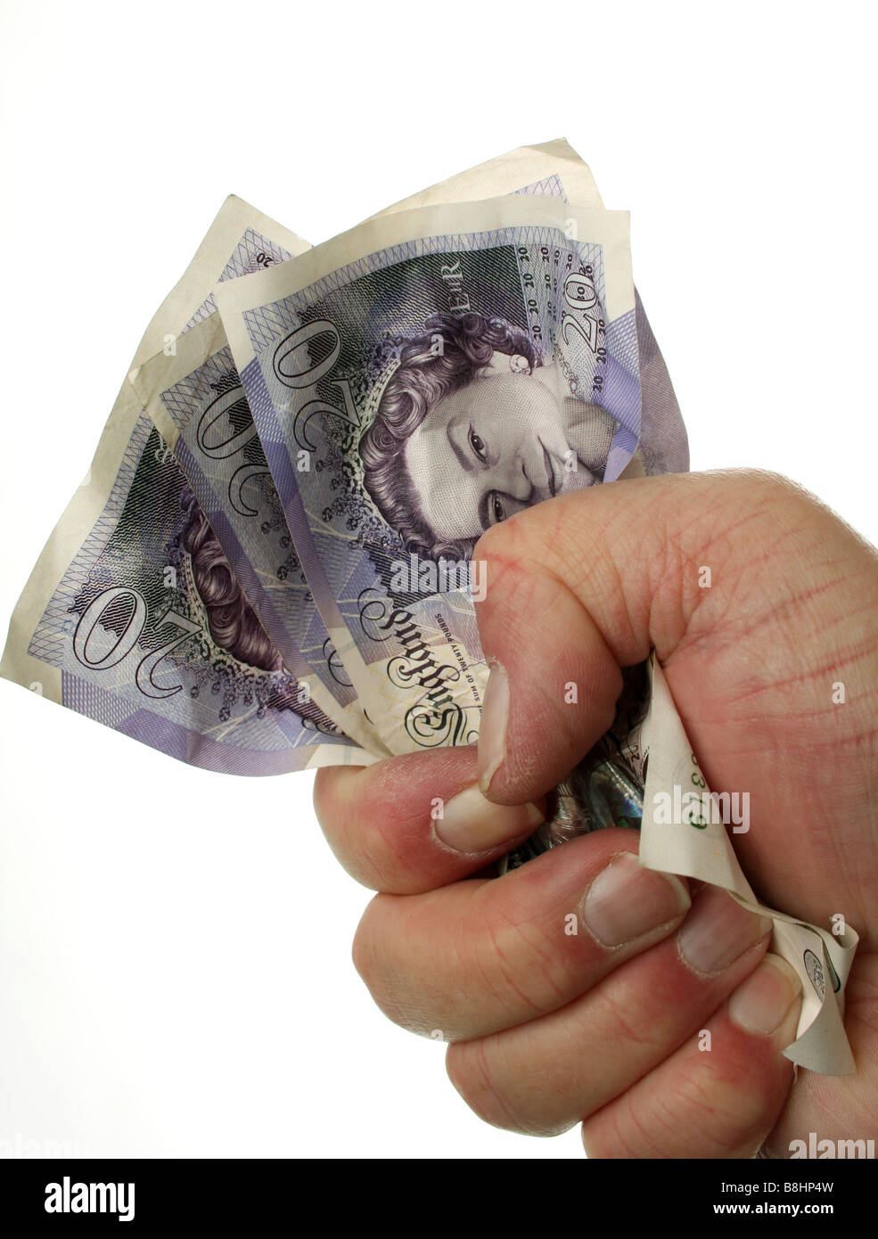 Hand clutching money hi-res stock photography and images - Alamy