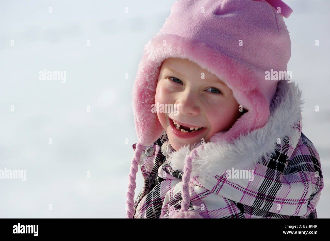 Smiling blonde girl missing tooth hi-res stock photography and images - Alamy