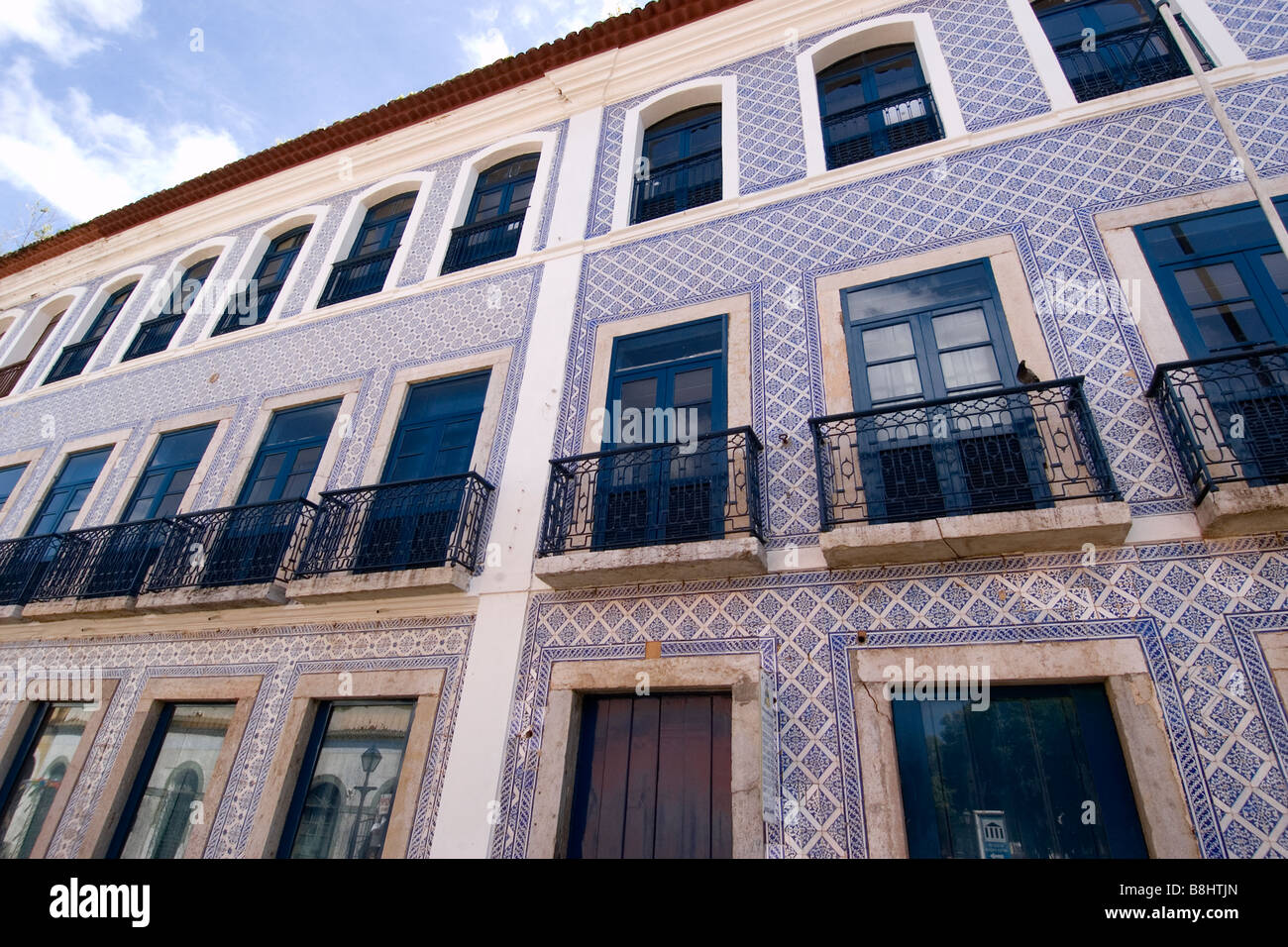 Old colonial building with typical Portuguese blue tiles at historical ...