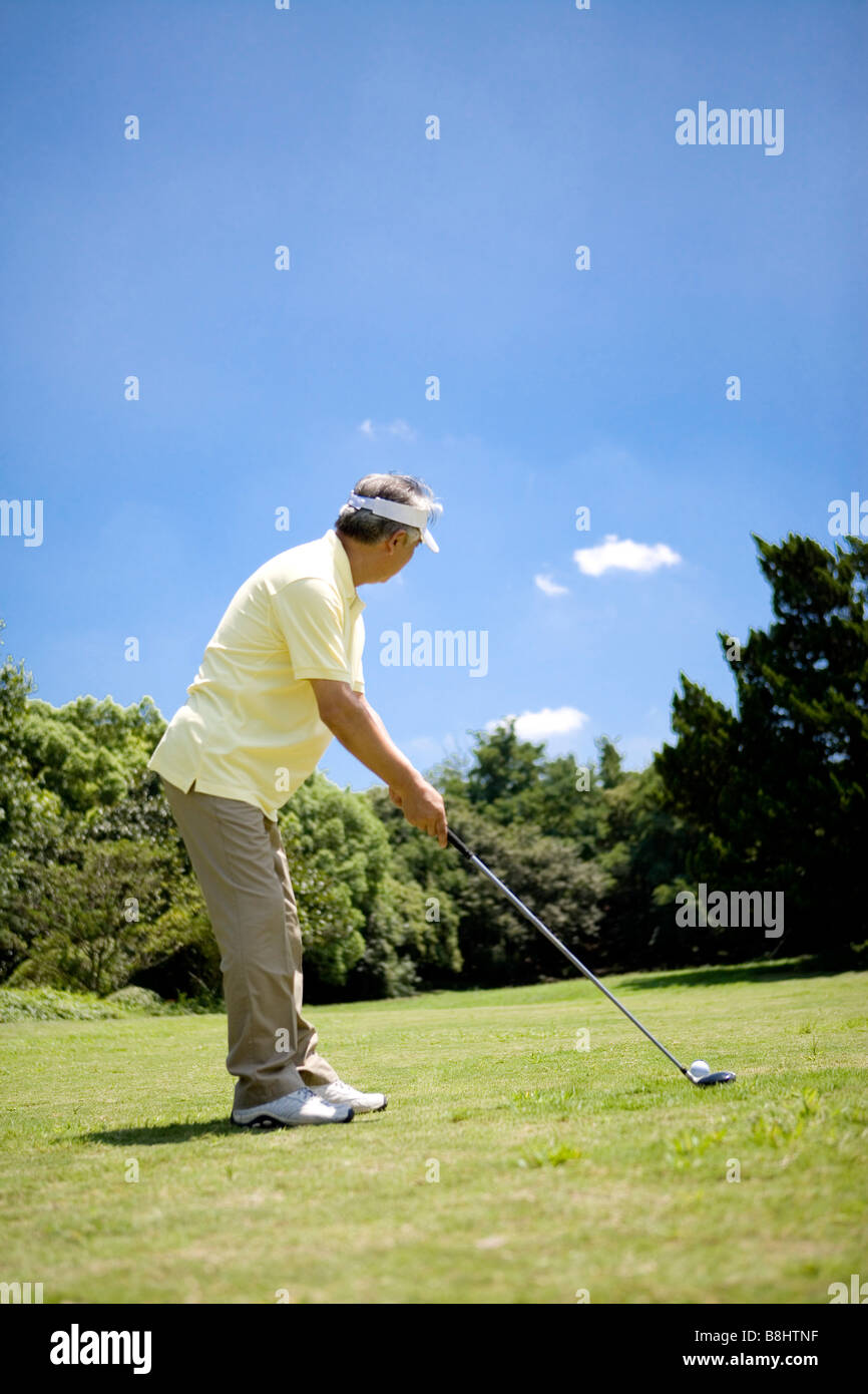 Chinese man playing golf hi-res stock photography and images - Alamy