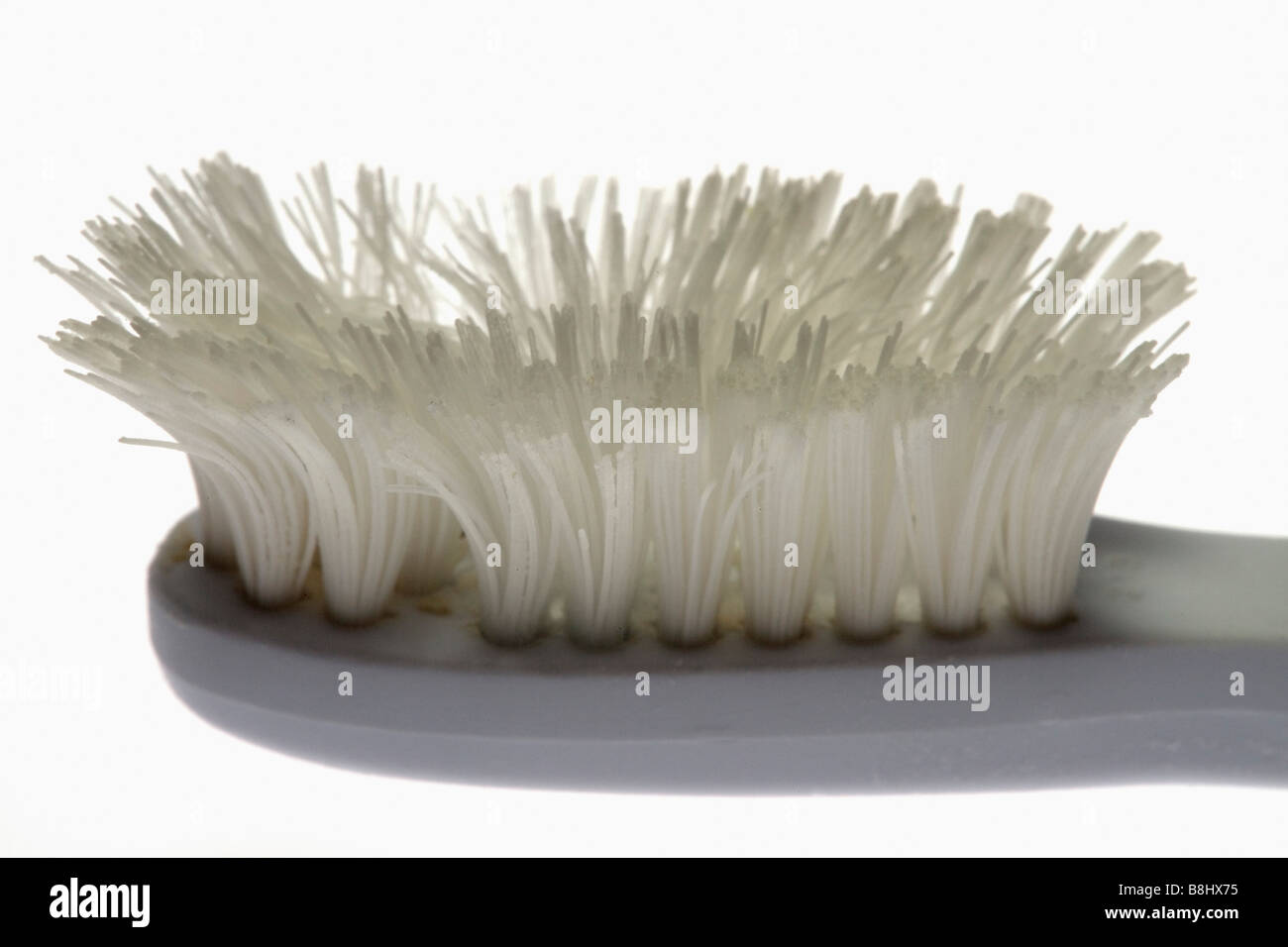 Used toothbrush head Stock Photo - Alamy