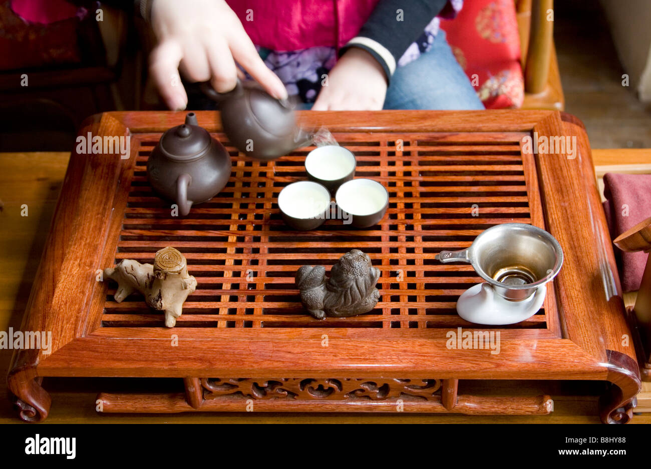 Serving tea in kongfu old ceremonial style Sichuan China Stock Photo ...