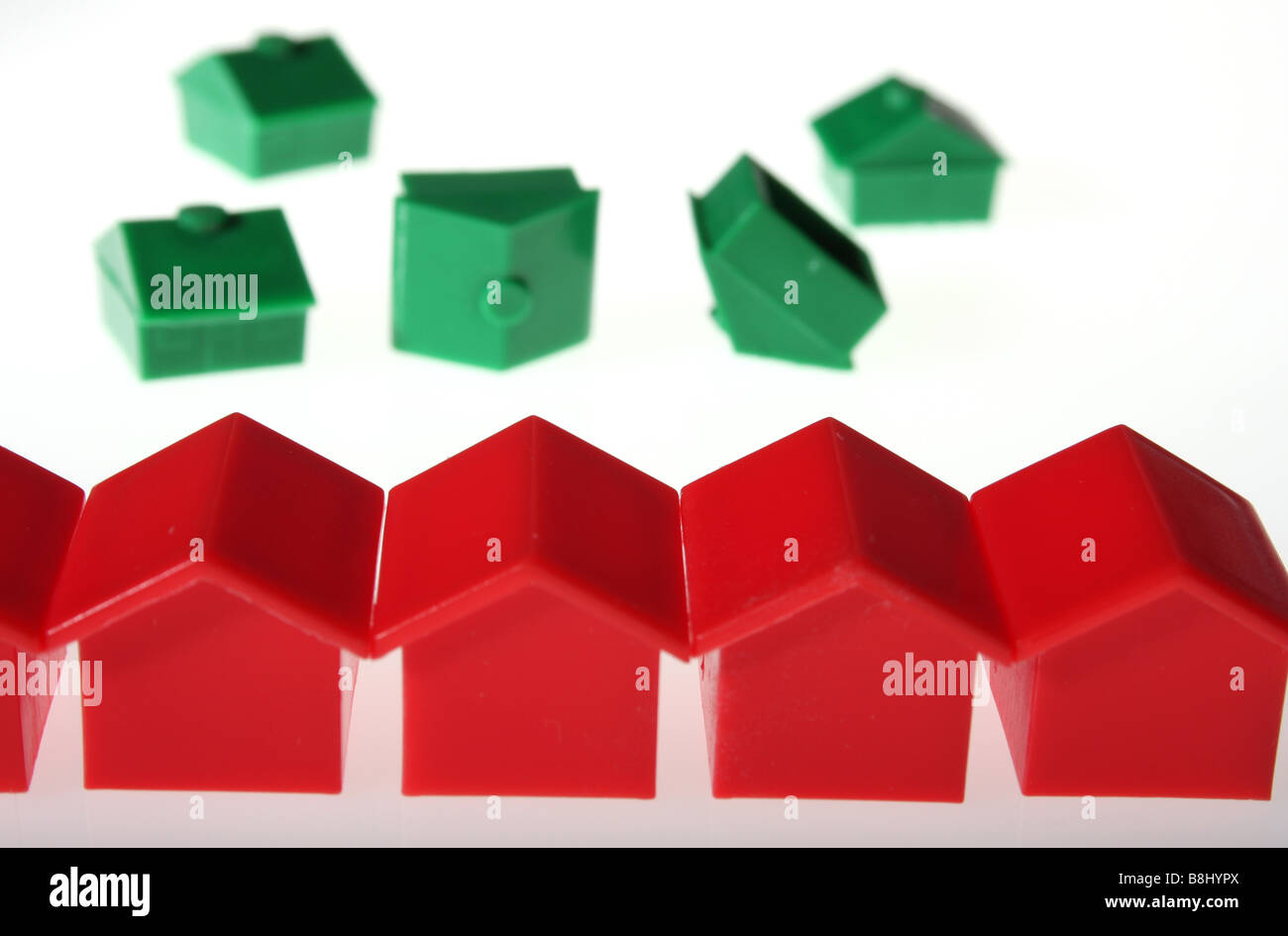 Monopoly houses shot against a white background Stock Photo - Alamy
