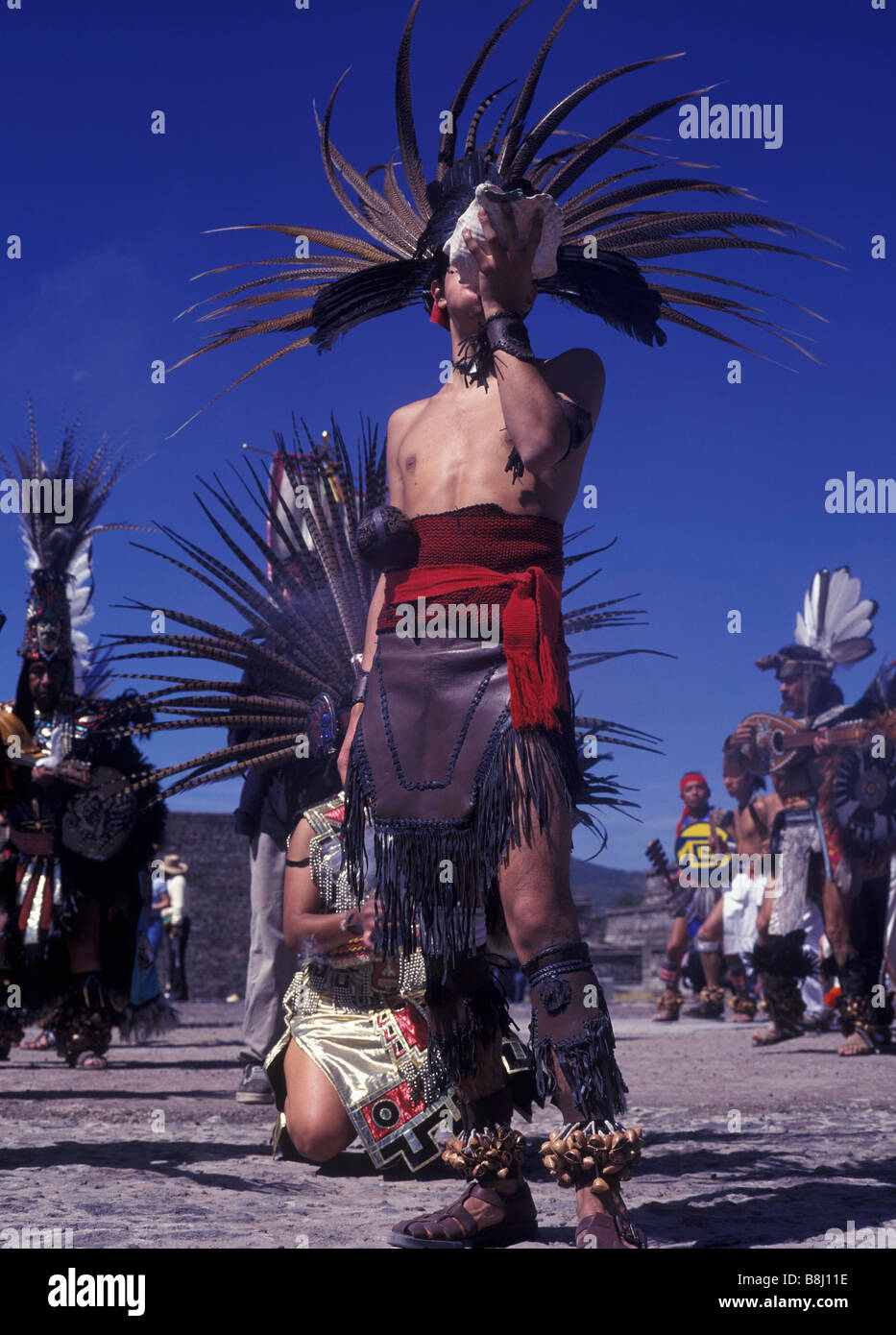 Traditionally dressed figures at Teotihuacan site in Mexico Stock Photo ...