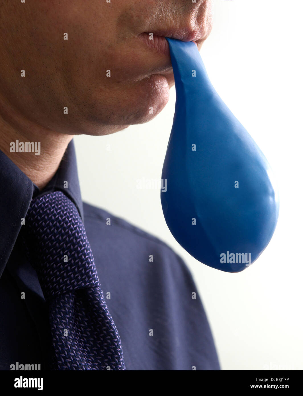 apathetic balloon blowing Stock Photo - Alamy