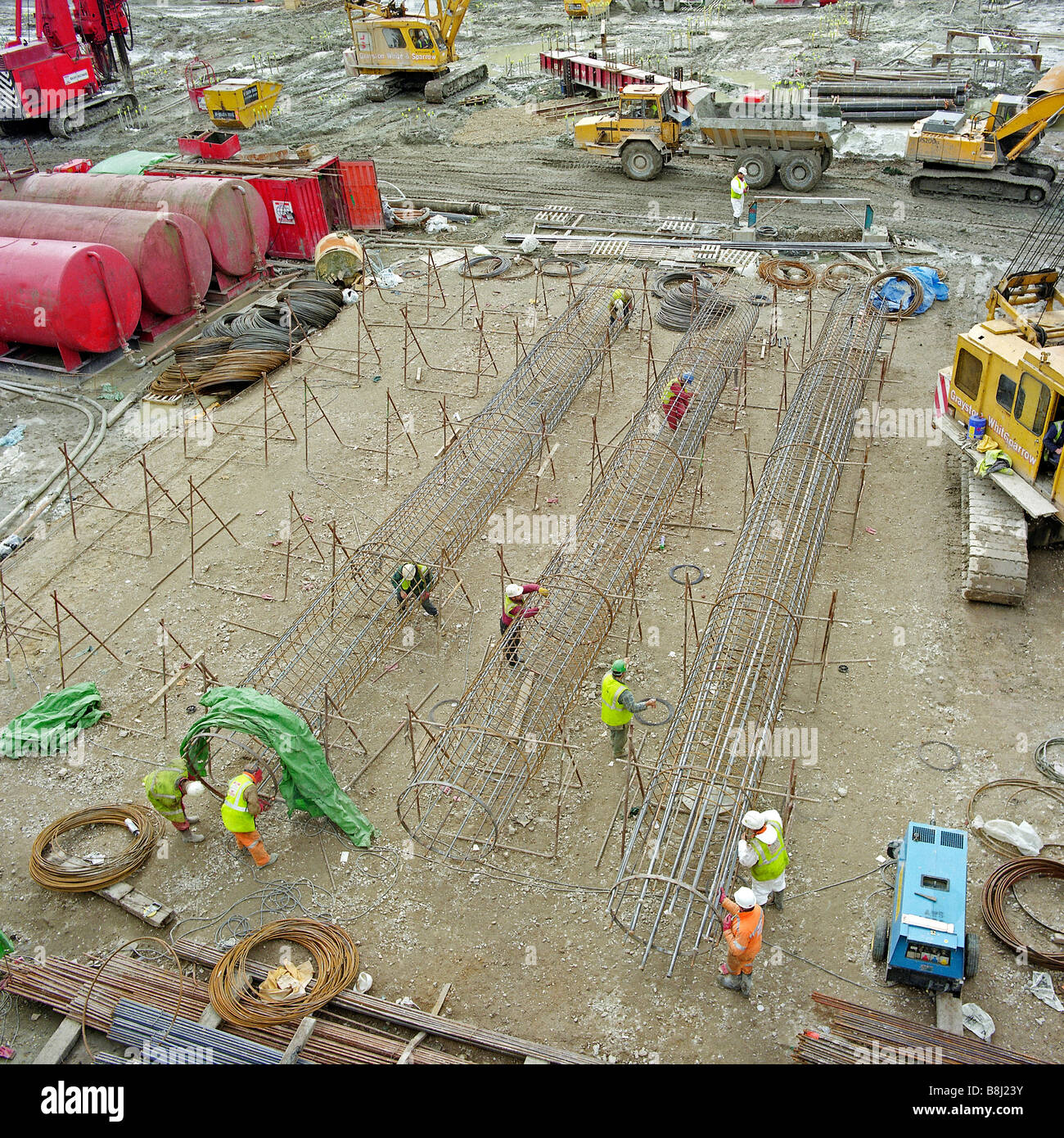 Contractors fabricating steel cages to provide additional strength for ...