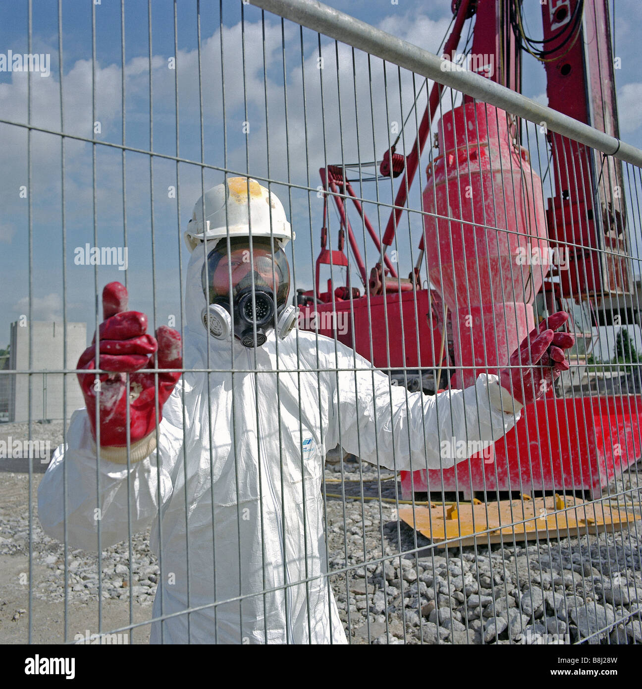 Contractor wearing special protective equipment after discovering an ...