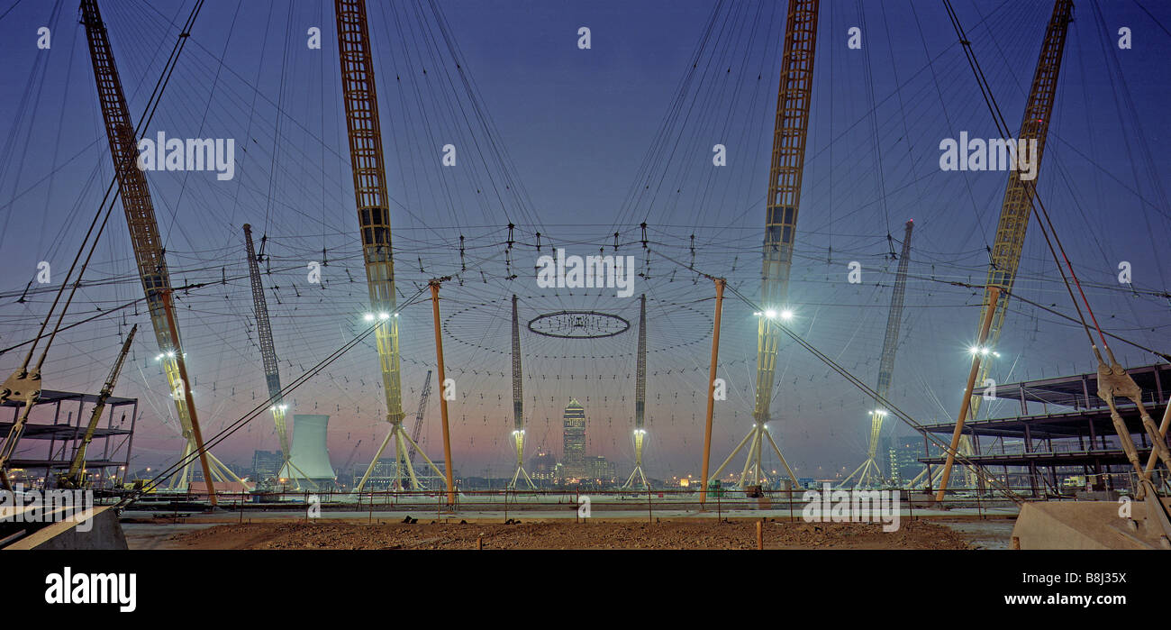 Like a giant spider's web, the cable net structure is raised during ...