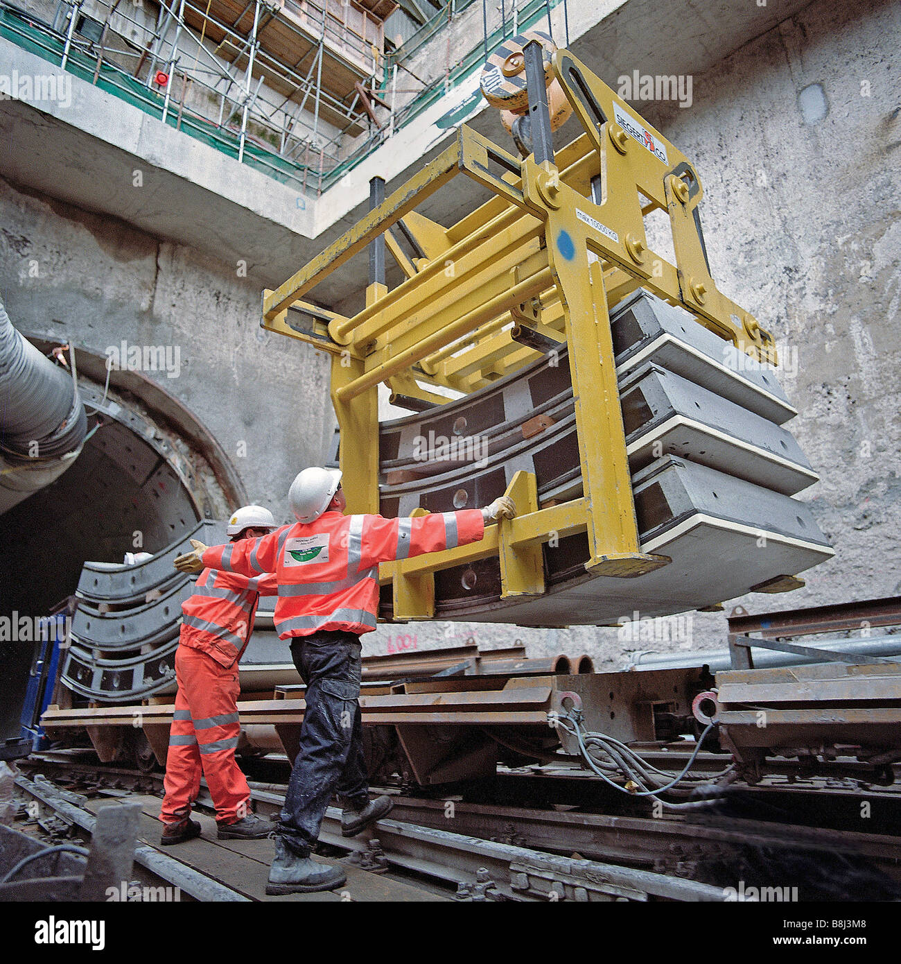 Concrete lining segments being loaded onto works train for ...