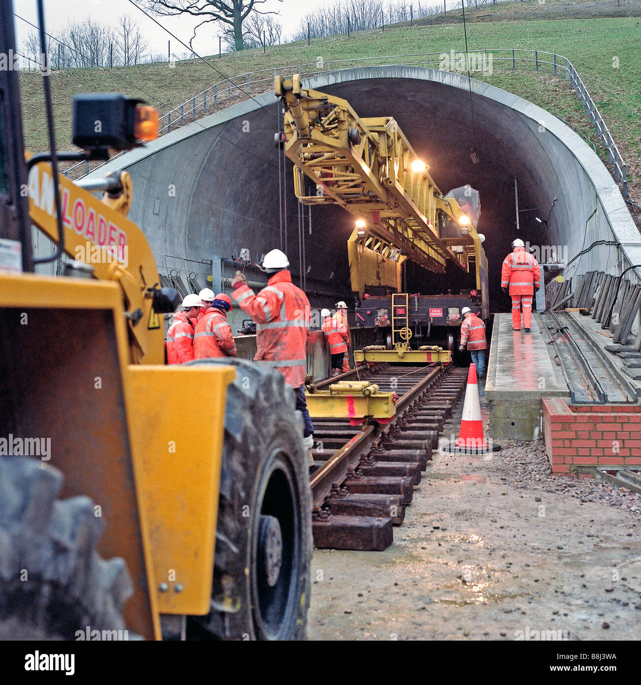 Tracklaying machine running on temporary track exits North Downs Tunnel ...
