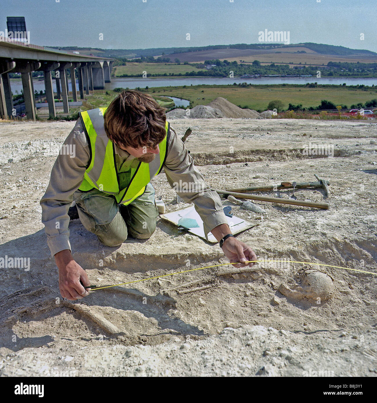 Archaeologist investigates an Anglo Saxon burial chamber at the Medway ...