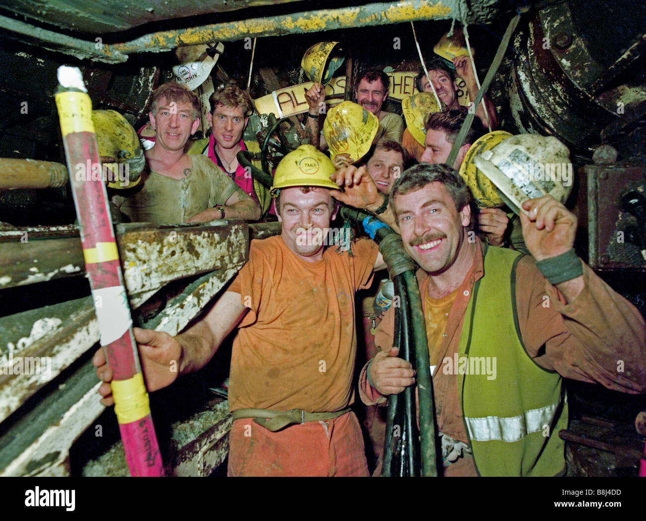 Channel Tunnel workers celebrate the breakthrough of the probe drill ...
