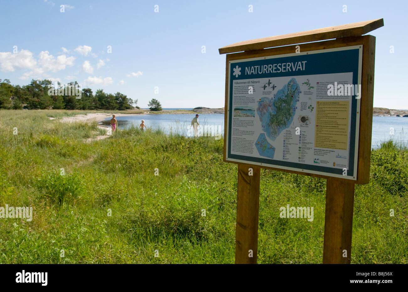 Beach and information sign in archipelago Stock Photo - Alamy