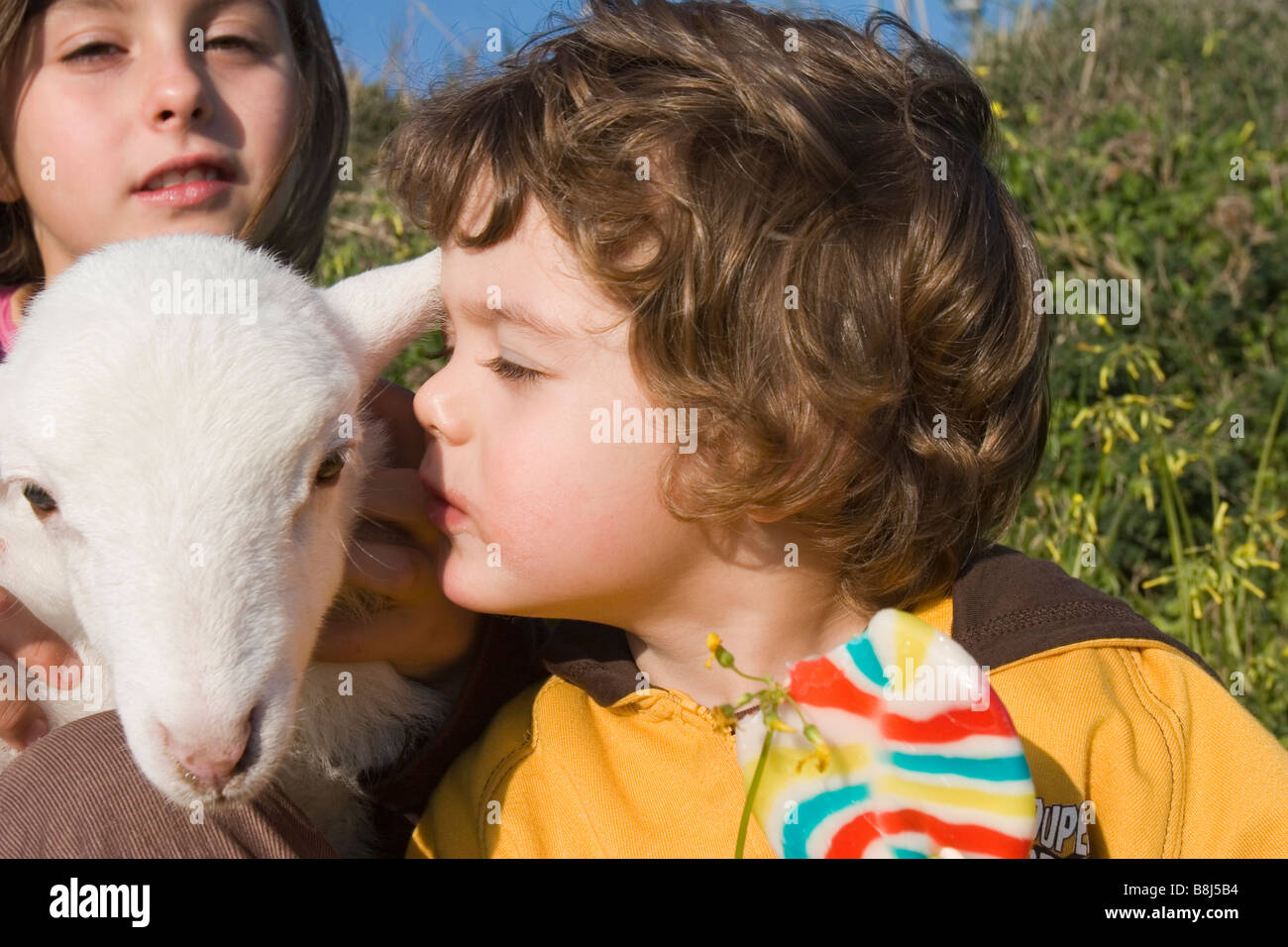 Children with sheep and goats hi-res stock photography and images - Alamy