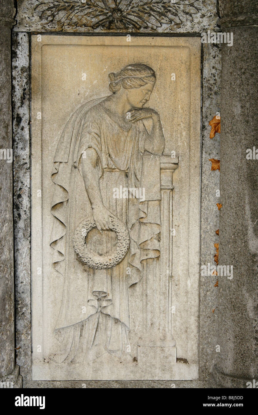 Ancient female sculpture at a gravestone in a grave yard Stock Photo ...