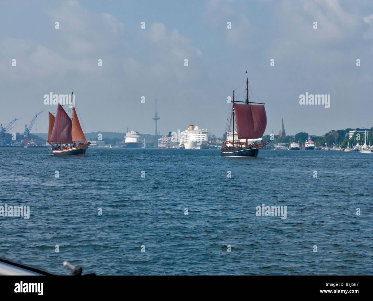 Passenger Ships and traditional Sailboat in Kiel Harbor Stock Photo - Alamy