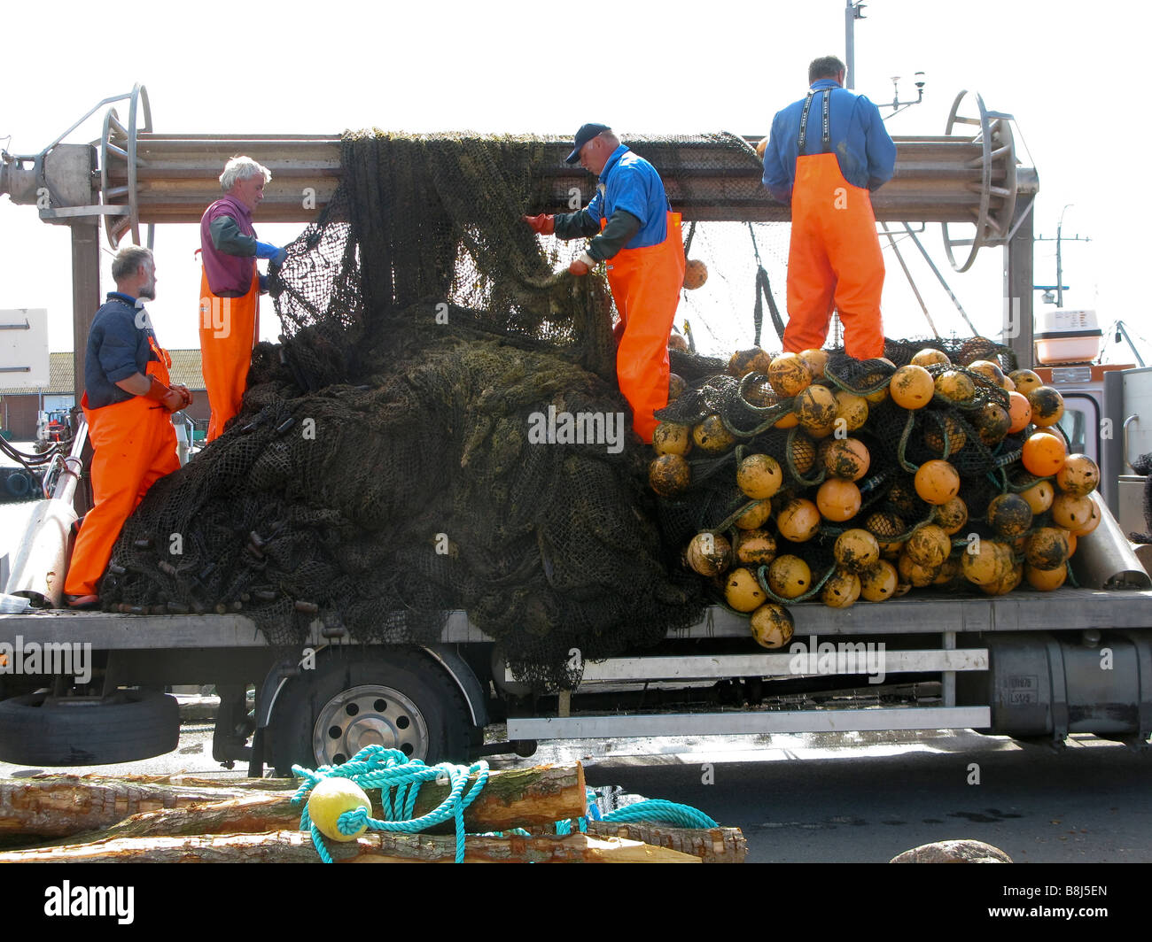 Fishermen sorting trawl For editorial use only Stock Photo - Alamy