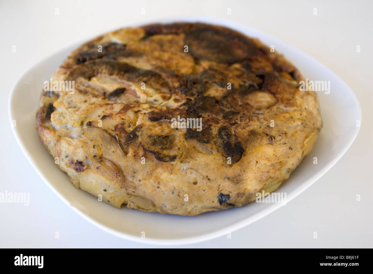 Tortilla de patat, a popular dish and a staple food in many parts of ...
