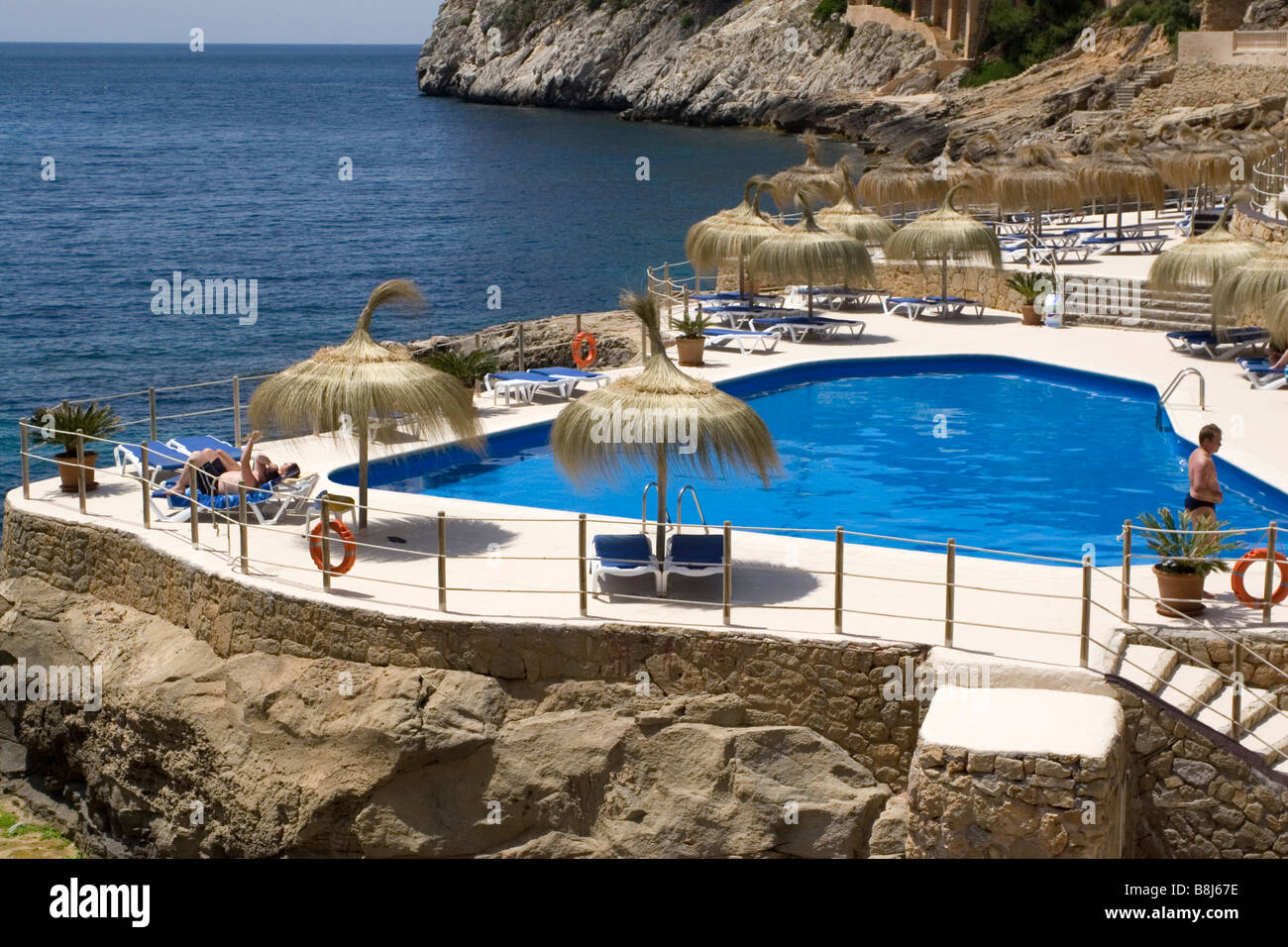 A seaside swimming pool on the island of Mallorca (Majorca).It's an ...