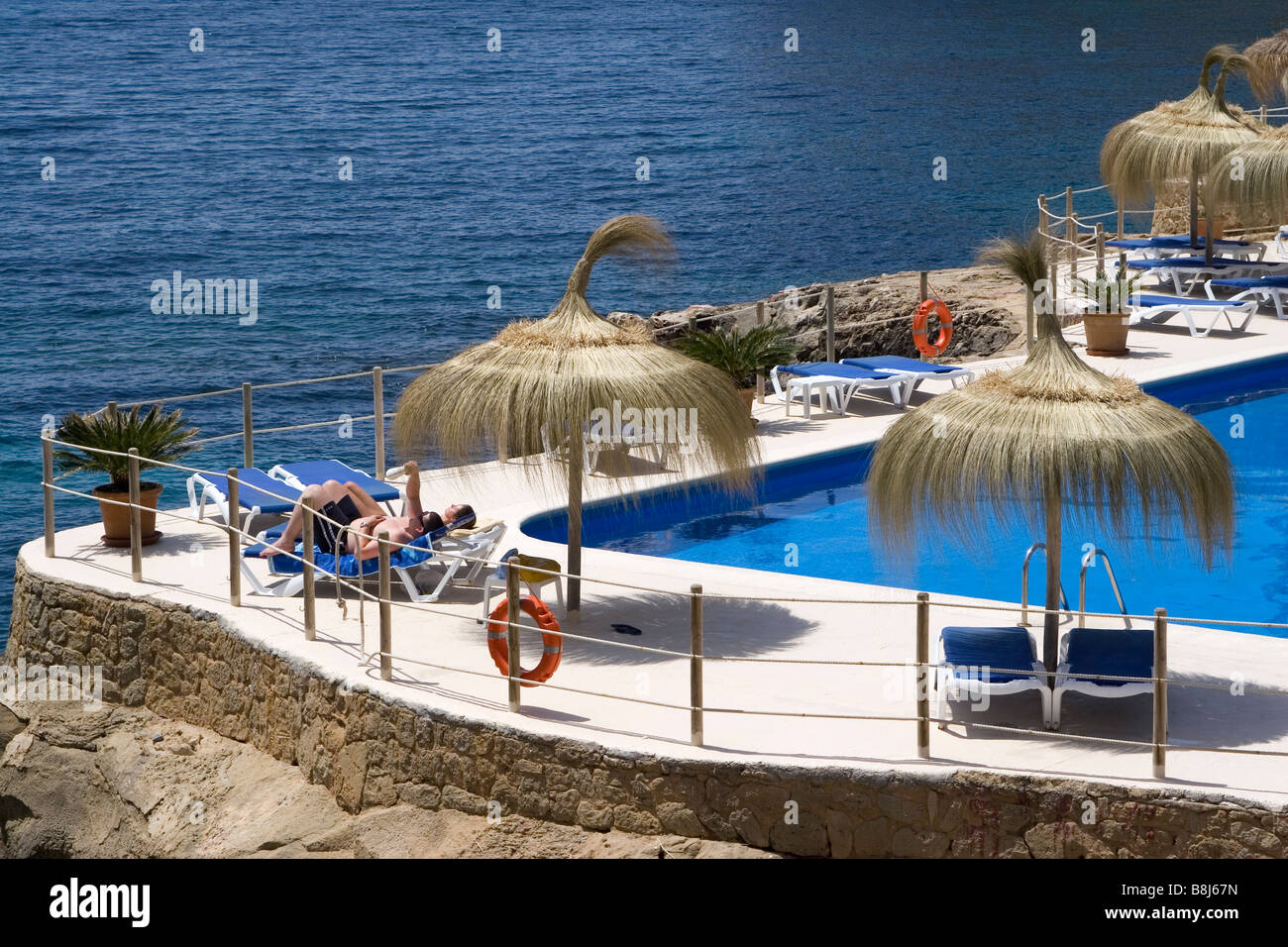 A seaside swimming pool on the island of Mallorca (Majorca).It's an ...