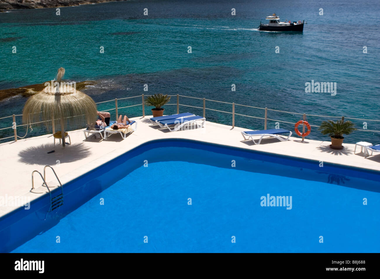 A seaside swimming pool on the island of Mallorca (Majorca).It's an ...