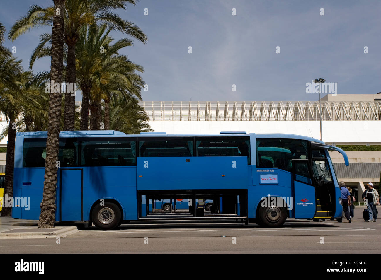 Buses wait to pick up holiday makers at Palma's international airport ...