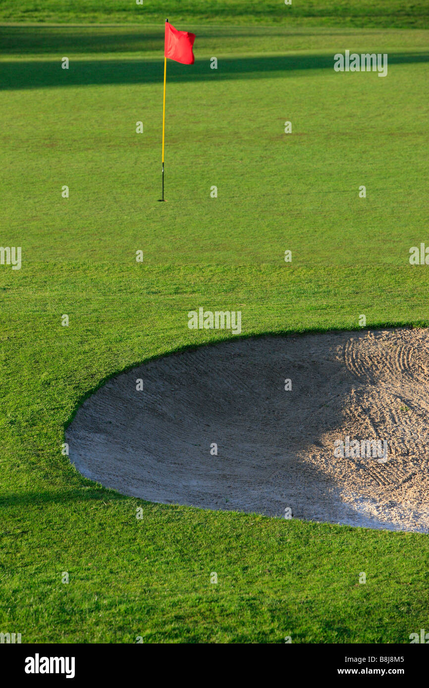 golf course fairway sand bunker red and green abstract image sand pit ...