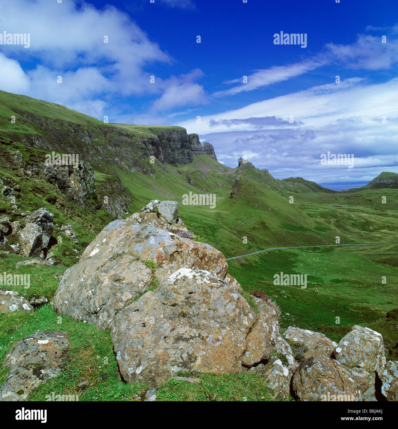 Trotternish peninsula Rock formations curved ledges Green covering ...