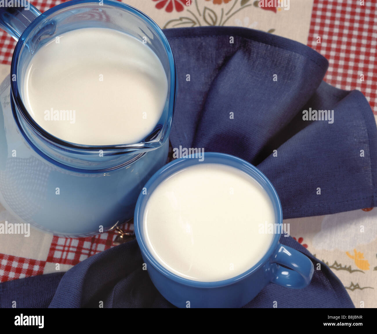 a milk blue glass pot and cup Stock Photo - Alamy